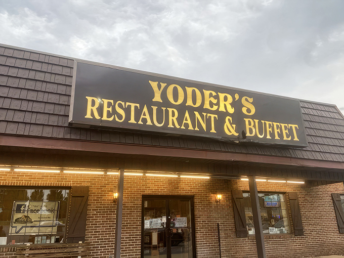 The brick exterior of Yoder's welcomes hungry travelers with its wooden shutters and simple signage &ndash; like a warm handshake before the culinary embrace inside.