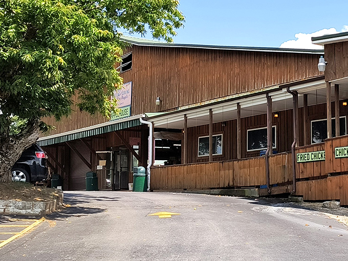 The rustic wooden exterior of Carver's Applehouse Restaurant welcomes hungry travelers like an old friend promising comfort food and mountain hospitality.
