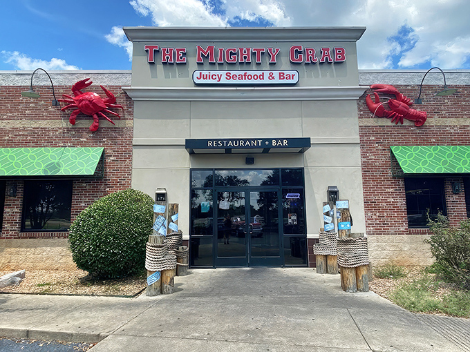 Giant red crabs flank the entrance to this seafood haven, as if guarding the treasures within. The brick-and-stucco exterior promises casual comfort with a touch of coastal flair.