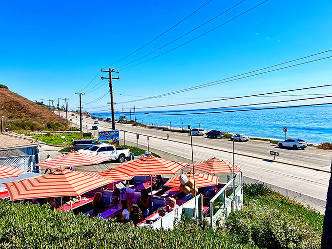 The view alone is worth the trip! Orange-striped umbrellas frame the Pacific Ocean panorama that serves as Malibu Seafood's million-dollar backdrop.