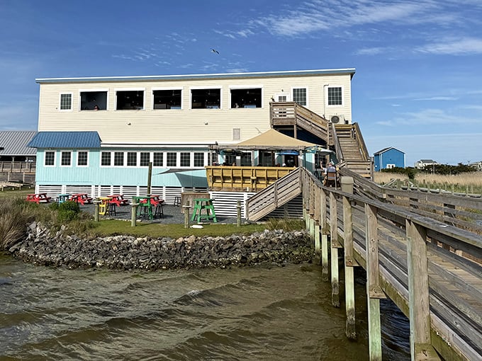 Look at that view! This charming waterfront spot, accessible by boardwalk, promises fresh seafood and stunning North Carolina Outer Banks views.