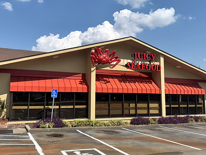 The bright red crab perched atop Juicy Seafood's facade isn't just decoration&mdash;it's a promise of the treasures waiting inside this Smyrna seafood haven.