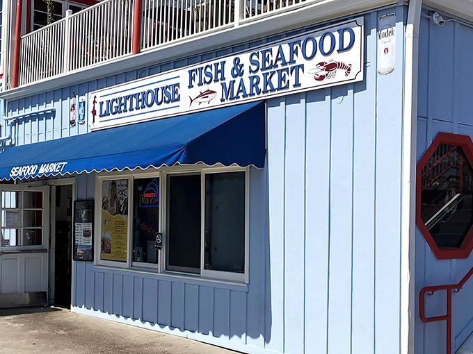 The quintessential coastal charm of Lighthouse Oyster Bar & Grill beckons from Oceanside Harbor like a siren song for seafood lovers.