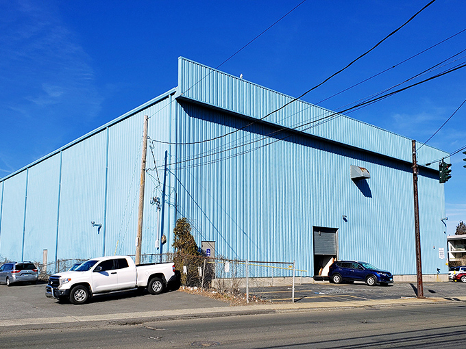The unassuming blue exterior hides a universe of treasures within. Like a TARDIS of trinkets, it's bigger on the inside.