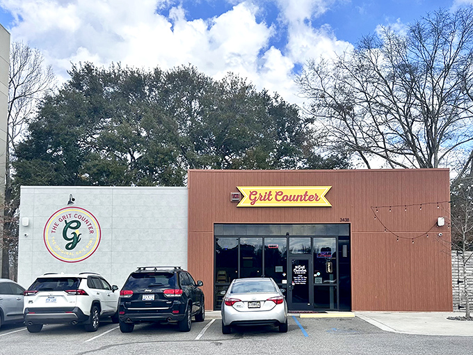A brown and white facade with a cheerful yellow sign that doesn't need to shout&mdash;the food does all the talking here.