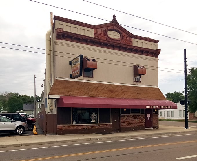 The unassuming exterior of Hickory Bar-B-Q stands like a time capsule on Dayton's streets, its burgundy awning a beacon for those in-the-know.