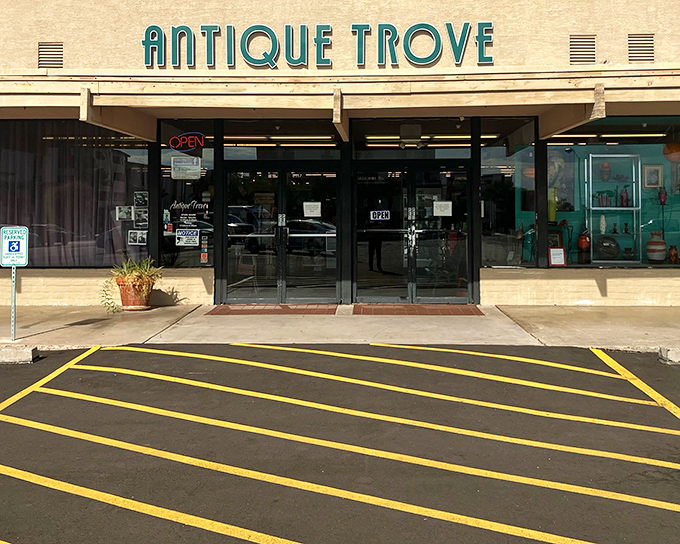 The retro turquoise signage screams mid-century charm, much like that one uncle who still uses "groovy" unironically but somehow makes it work.