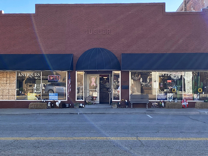 The unassuming brick exterior of Abilene Downtown Antique Mall hides a universe of treasures within, like a TARDIS of trinkets waiting to be discovered.