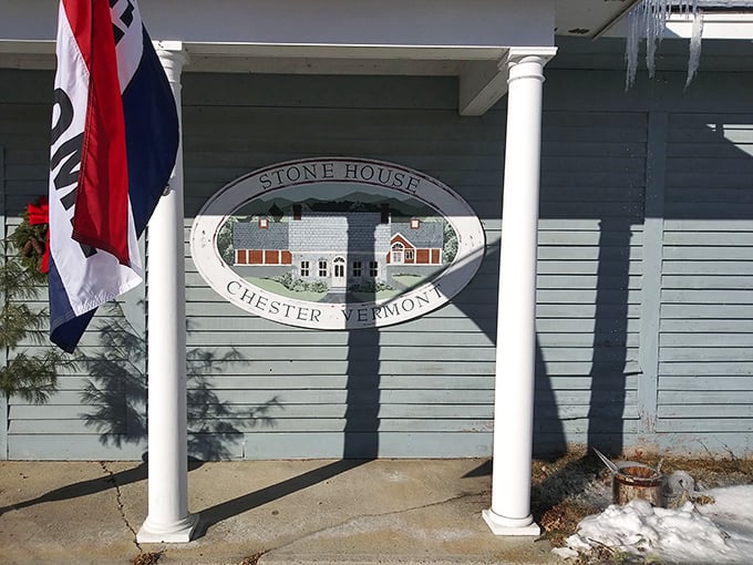 The charming blue exterior welcomes treasure hunters with classic New England architecture that promises adventures inside.