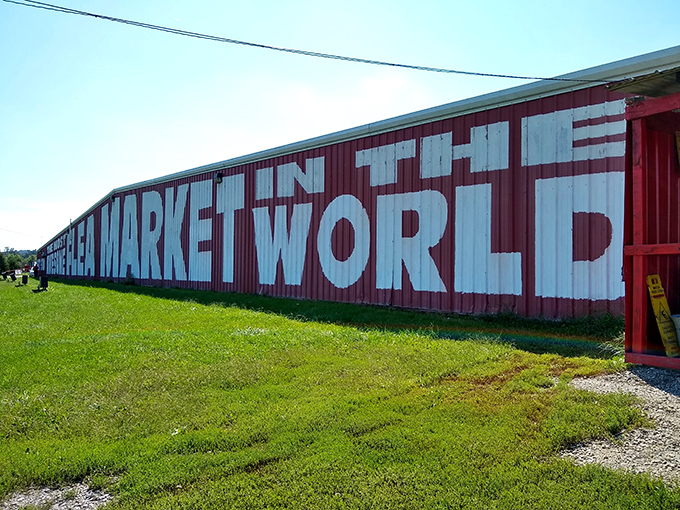 The red exterior of Flea Market World stretches like a retail horizon, promising treasures within. Kentucky's bargain hunters know: bigger building, better finds. 