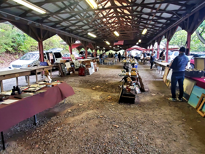 Under this covered pavilion, weekend warriors hunt for bargains while vendors display their wares. The thrill of discovery hangs in the air.