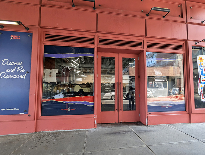 The iconic coral-red storefront of Artists & Fleas beckons with its "Discover and Be Discovered" promise &ndash; a treasure hunter's first glimpse of paradise.