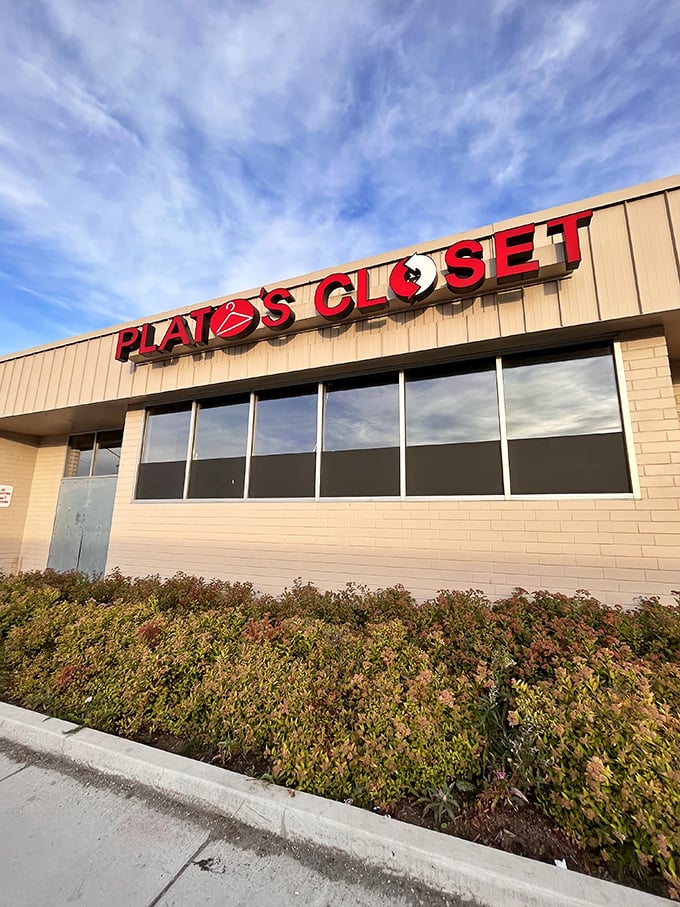 The unassuming storefront of Plato's Closet in Anchorage—where fashion dreams and budget realities find their happy compromise.
