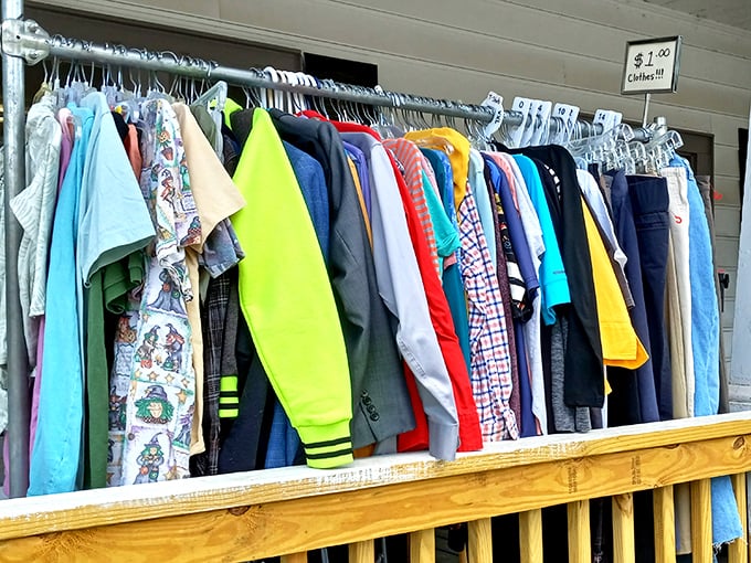 A rainbow of possibilities hangs from the outdoor racks, where one dollar can transform your wardrobe faster than a superhero in a phone booth.