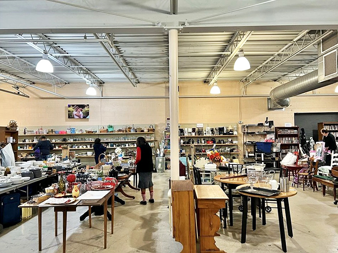 Tables laden with household treasures create a maze of possibility. Like archaeological digs for the modern shopper, each display offers artifacts of everyday life waiting to be rediscovered.