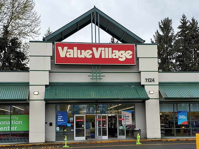 The iconic red Value Village sign beckons like a lighthouse for treasure hunters navigating the sea of secondhand possibilities in Puyallup.