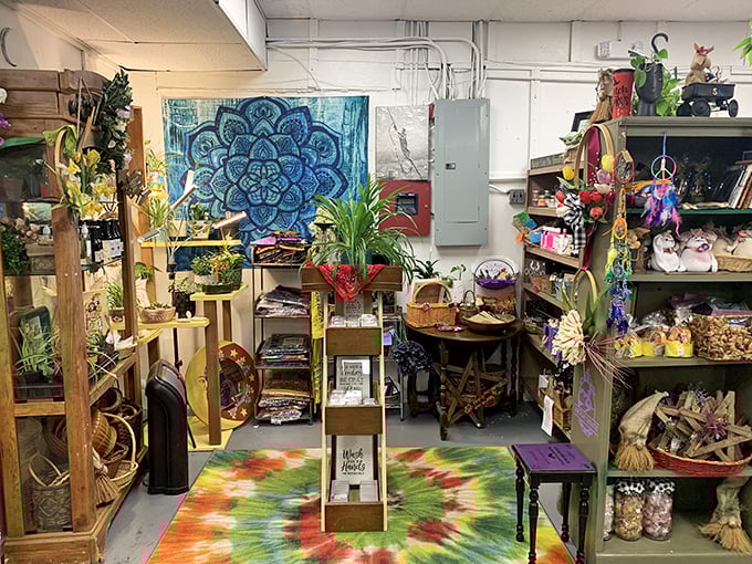 A bohemian paradise awaits! This corner booth combines tie-dye vibes with spiritual decor, proving that peace, love, and vintage shopping go perfectly together.