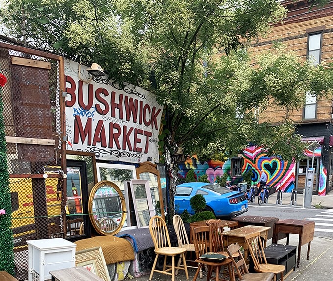 The iconic Bushwick Market sign welcomes treasure hunters to this Brooklyn wonderland, where furniture finds await under the shade of urban trees.