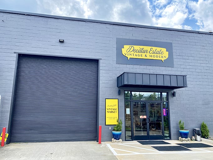 The unassuming exterior hides a treasure trove within. That bright "OPEN" flag is basically waving "come find something amazing!"