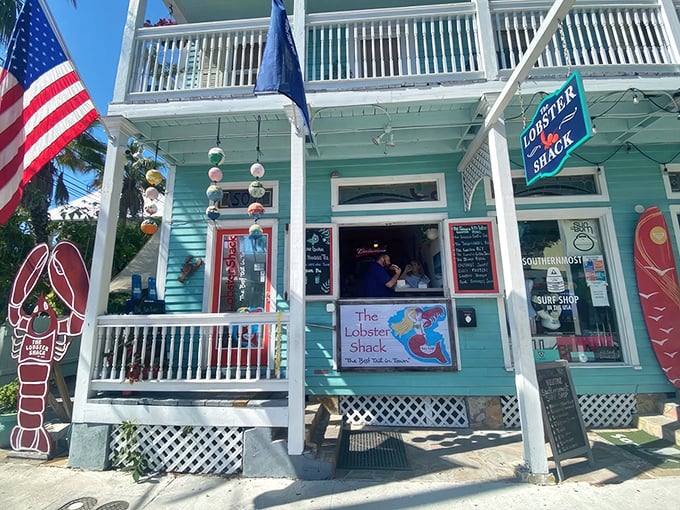 A turquoise beacon of seafood salvation in Key West, where the American flag waves as if to say, "Your lobster search ends here, patriot."