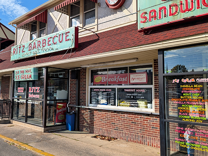 The weathered turquoise sign of Ritz Barbecue stands as a beacon of hope for hungry travelers – a promise of comfort food that's outlasted countless food trends.