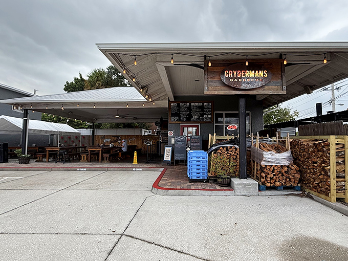The converted gas station that launched a thousand meat sweats. Crydermans' unassuming exterior hides barbecue magic within, with stacked firewood promising smoky delights.