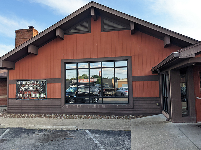 That rustic barn-style exterior isn't just for show &ndash; it's a beacon calling hungry travelers to barbecue paradise.