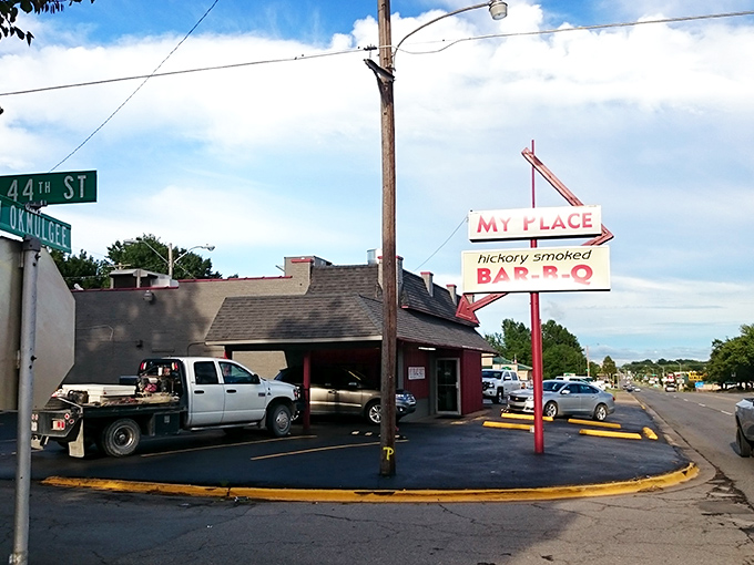 The classic roadside BBQ joint sign &ndash; a beacon of hope for hungry travelers and a promise of smoky delights within.