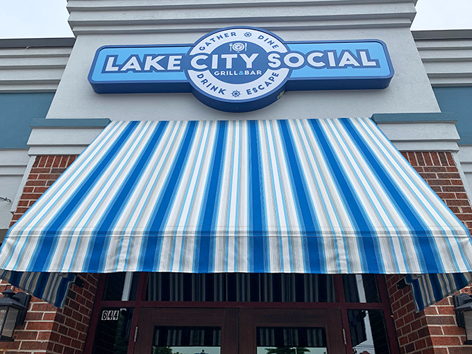 The blue and white awning of Lake City Social beckons like a nautical flag signaling "delicious food ahead" in the heart of Wisconsin Dells.