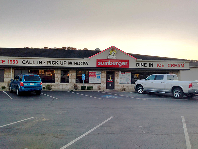 Sumburger's twilight silhouette beckons hungry travelers with its iconic sign, promising burgers worth a detour since 1953.