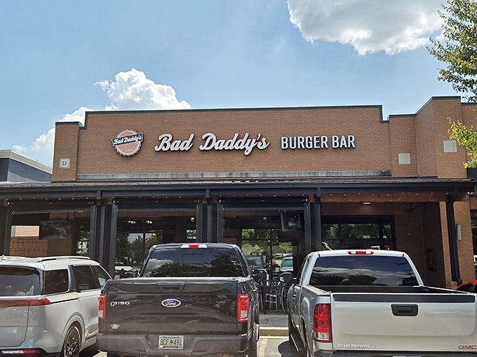 The unassuming brick exterior of Bad Daddy's hides a burger paradise within. Like finding a treasure map in your attic, this place promises delicious adventures.