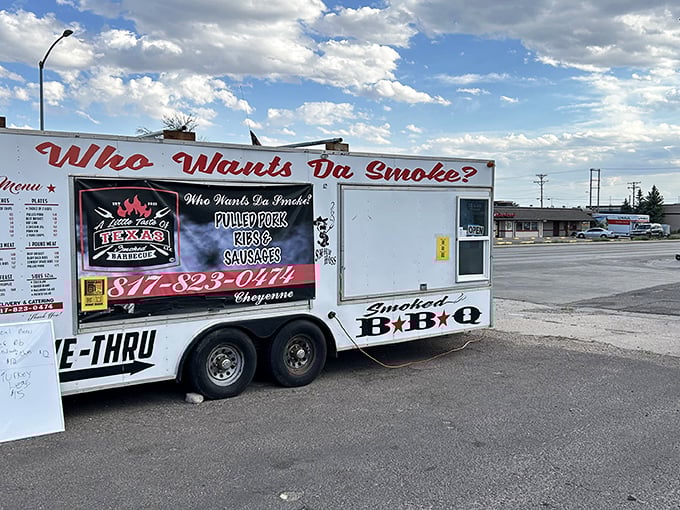 The unmistakable sign of barbecue salvation in Wyoming. "Who Wants Da Smoke?" isn't just a question&mdash;it's an invitation to meat paradise.