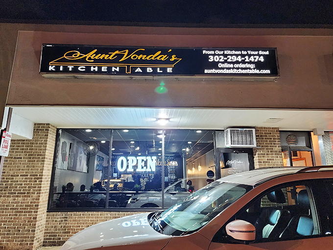 The glowing "OPEN" sign at Aunt Vonda's Kitchen Table isn't just an invitation&mdash;it's a beacon of culinary promise in Newark's dining landscape.