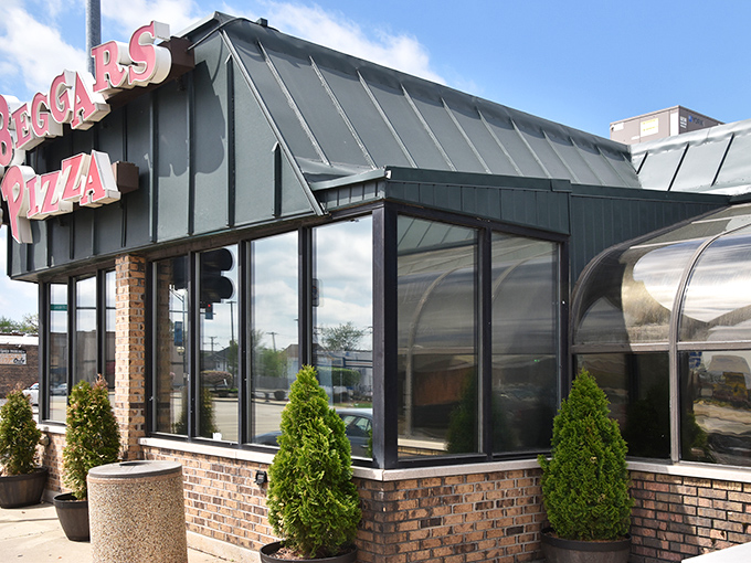 That iconic green roof and curved solarium window beckon pizza lovers like a lighthouse guides ships &ndash; except this beacon leads to cheese, not safety.