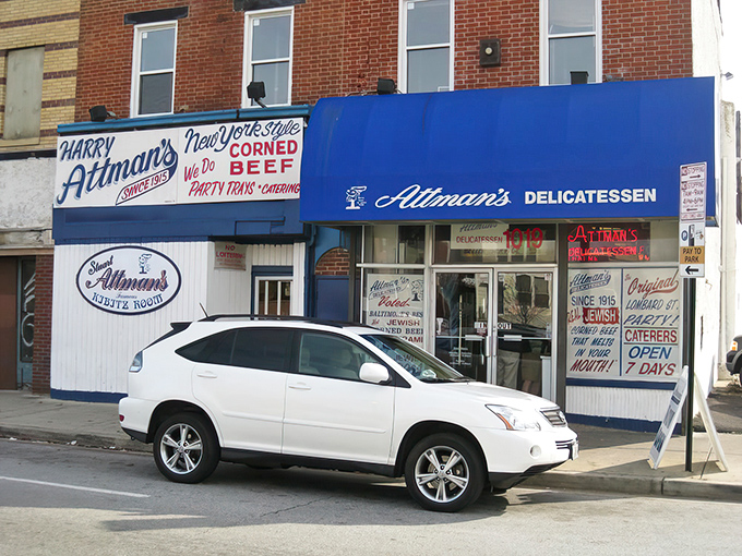 Attman's storefront stands as a proud survivor of Baltimore's historic "Corned Beef Row," where the promise of perfectly stacked sandwiches has been drawing crowds for generations.