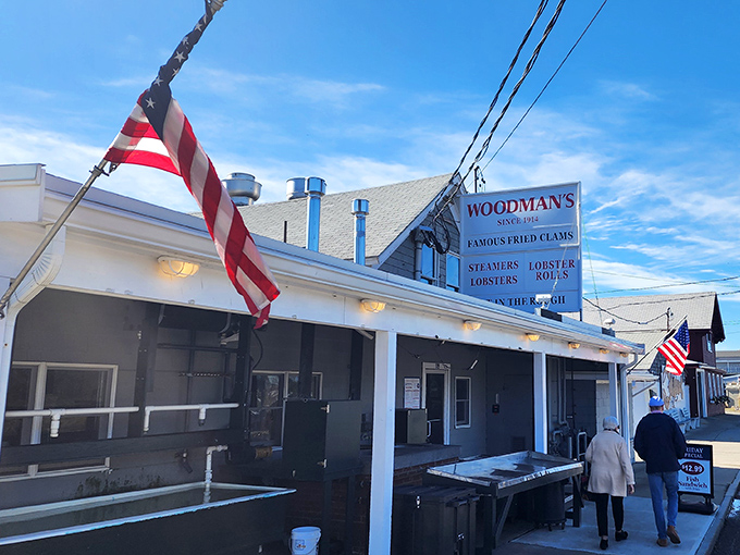 The iconic blue sign has welcomed seafood pilgrims for generations. American flags flutter in the salt air, promising patriotic levels of deliciousness inside.