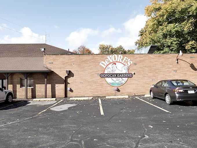 The unassuming brick exterior of Hopocan Gardens hides a culinary treasure that locals have cherished for generations.