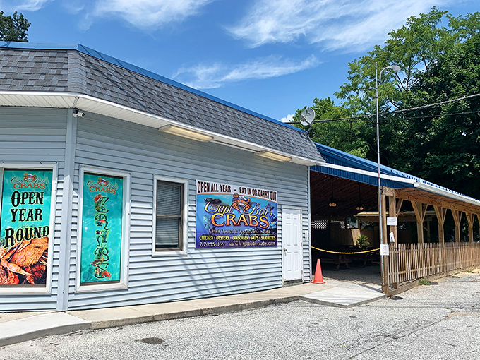 That cheerful crab mascot on the sign promises oceanic delights in the Pennsylvania heartland, and spoiler alert: he delivers.
