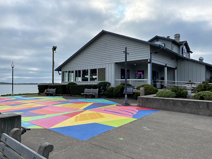 The colorful patio welcomes visitors with a splash of joy, proving that even on cloudy Oregon days, Mo's knows how to brighten your approach.