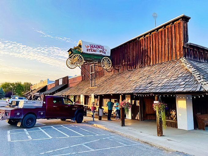 That covered wagon sign isn't just decoration &ndash; it's a promise of frontier-sized portions ahead.