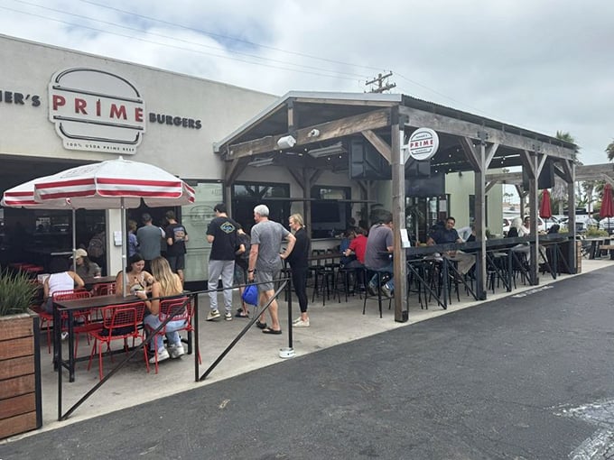 Weekend warriors and burger aficionados gather under the covered patio, where the only thing better than the people-watching is the food about to arrive.