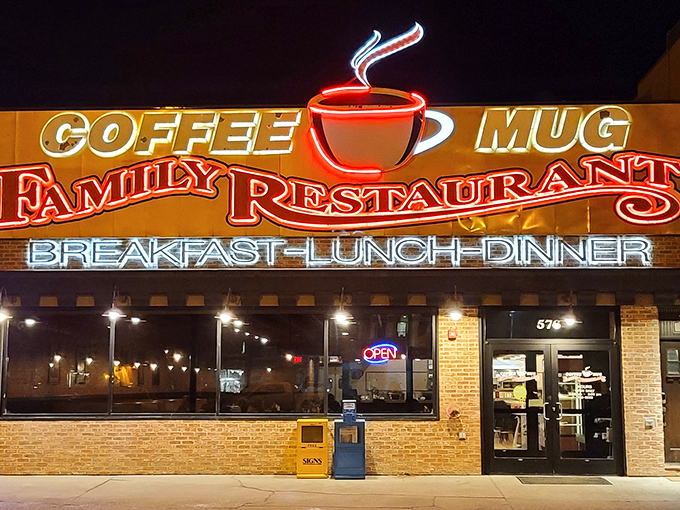 The neon glow of Coffee Mug's sign beckons like a lighthouse for hungry travelers on Idaho Street, promising three essential food groups: breakfast, lunch, and dinner.