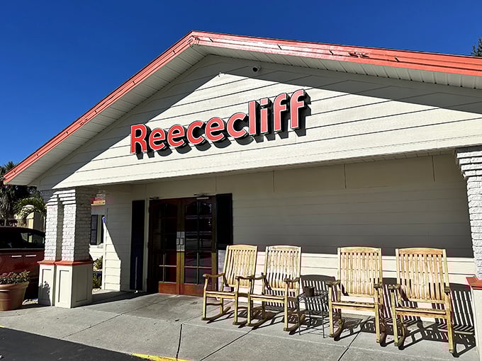 Those iconic red letters against white siding say it all &ndash; Reececliff isn't just a sign, it's a promise of homestyle goodness waiting inside.