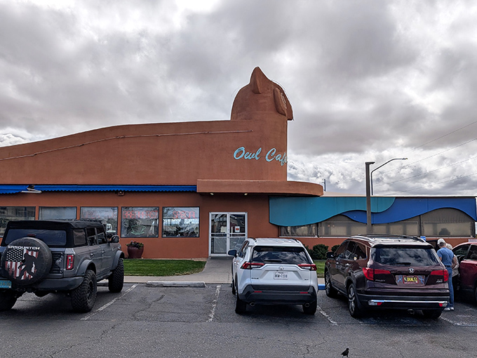 The unmistakable owl-shaped facade stands like a sentinel of comfort food, promising New Mexican delights within its adobe walls.