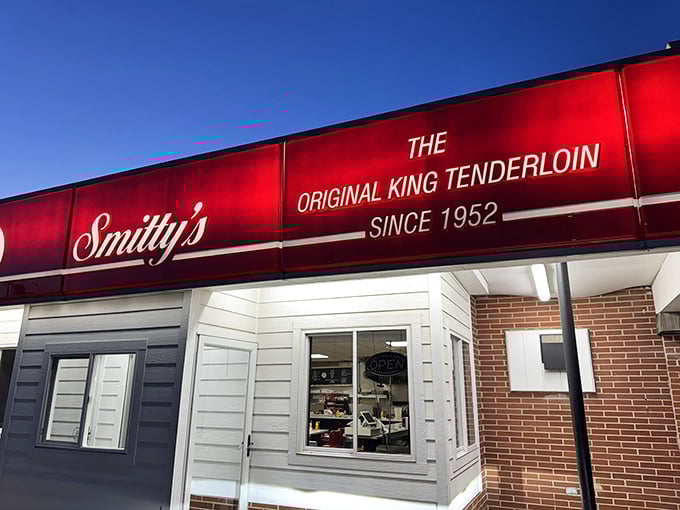 The iconic red awning of Smitty's glows like a beacon of hope for hungry travelers. "Original King Tenderloin" isn't just marketing—it's a seven-decade promise kept.