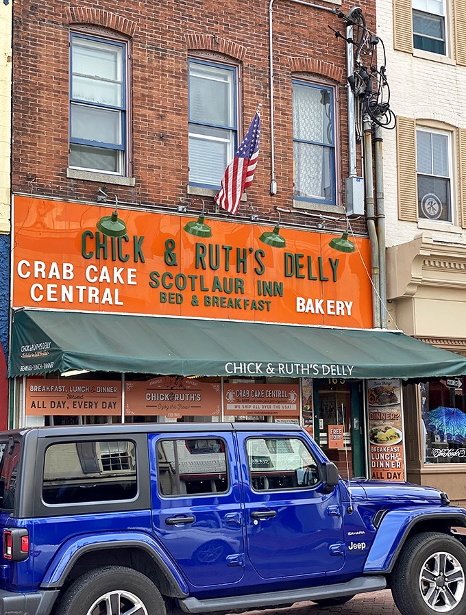 The iconic orange storefront of Chick & Ruth's stands proudly on Main Street in Annapolis, a beacon of comfort food that's been drawing hungry patrons for decades.