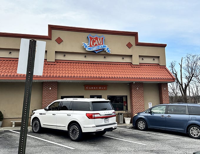The unassuming exterior of G & M Restaurant proves once again that culinary treasures often hide in plain sight. Maryland's crab cake mecca awaits inside.