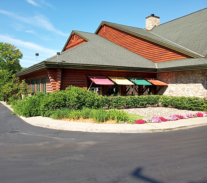 A sunny day welcome to Big Bear Lodge! Come on over and enjoy the cozy cabin atmosphere in Brownstown Township.