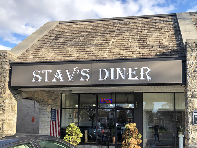 The unassuming stone facade of Stav's Diner hides Columbus's burger paradise &ndash; where culinary magic happens behind that simple sign.