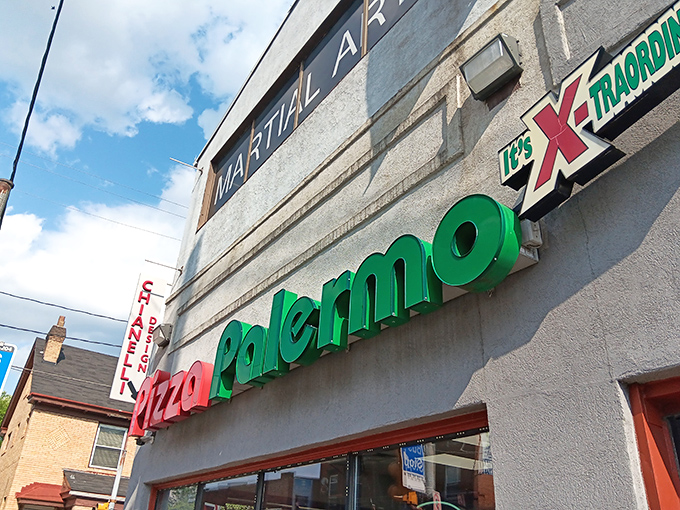 Where martial arts meets culinary artistry &ndash; Pizza Palermo's bold signage promises a knockout combination of flavors that's worth traveling across state lines for.